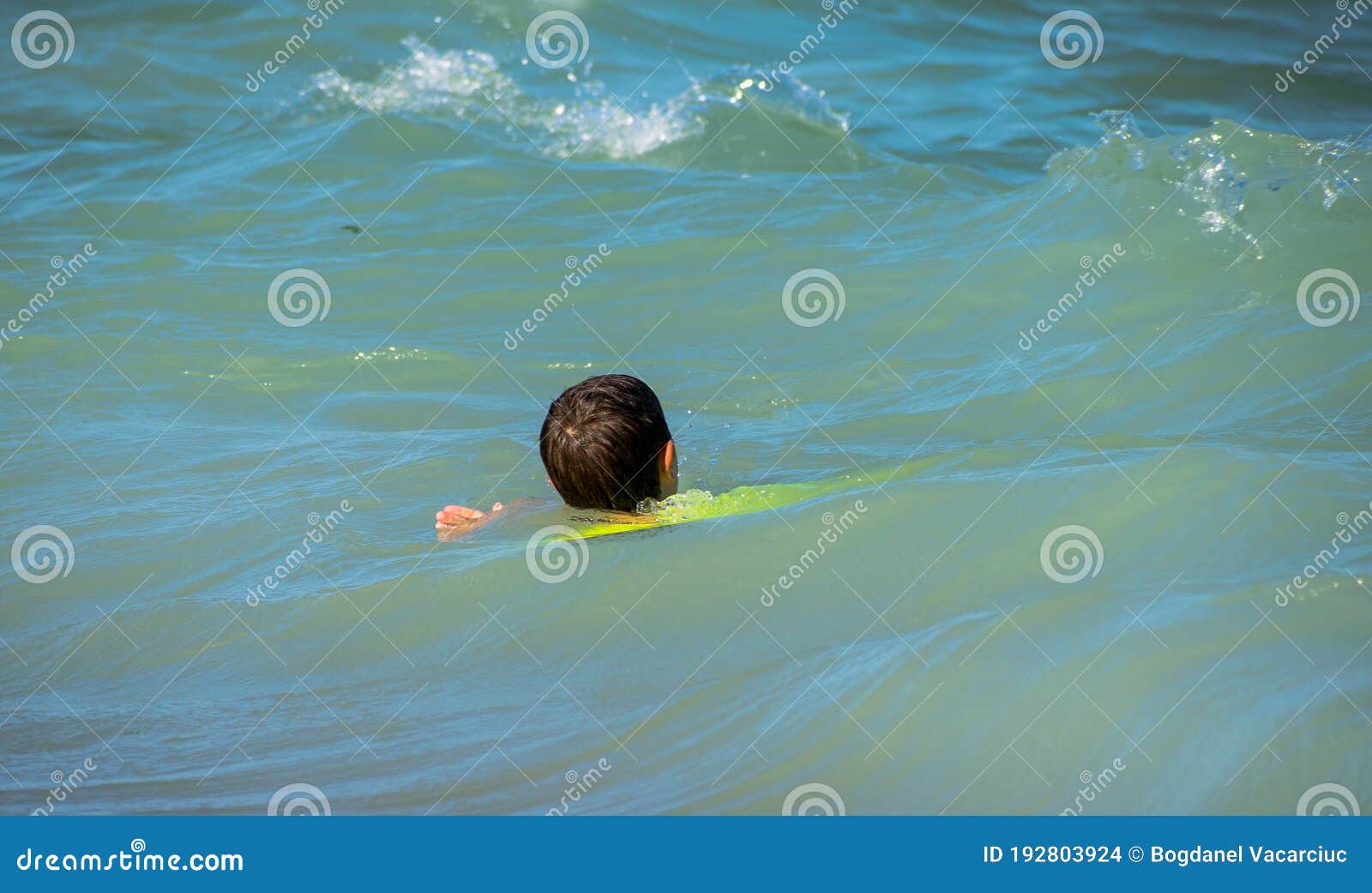 Child in the Waves of the Sea. Concept for Drowning Stock Photo - Image ...