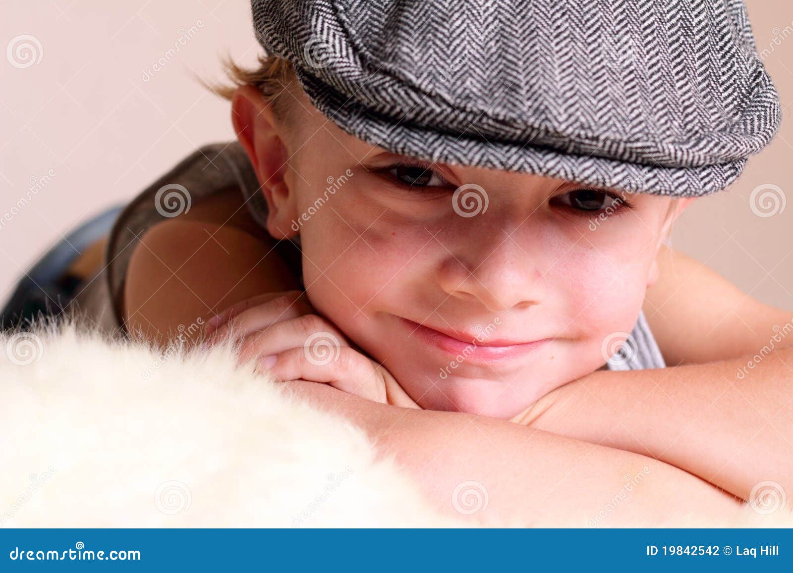 Child wearing Flat Cap stock photo. Image of cute, contented - 19842542
