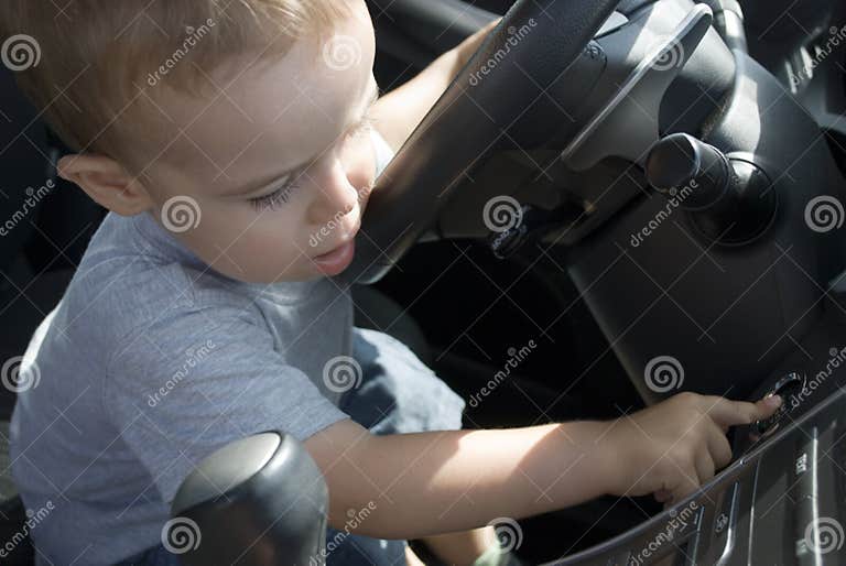 Child at the wheel stock photo. Image of concentration - 20353920