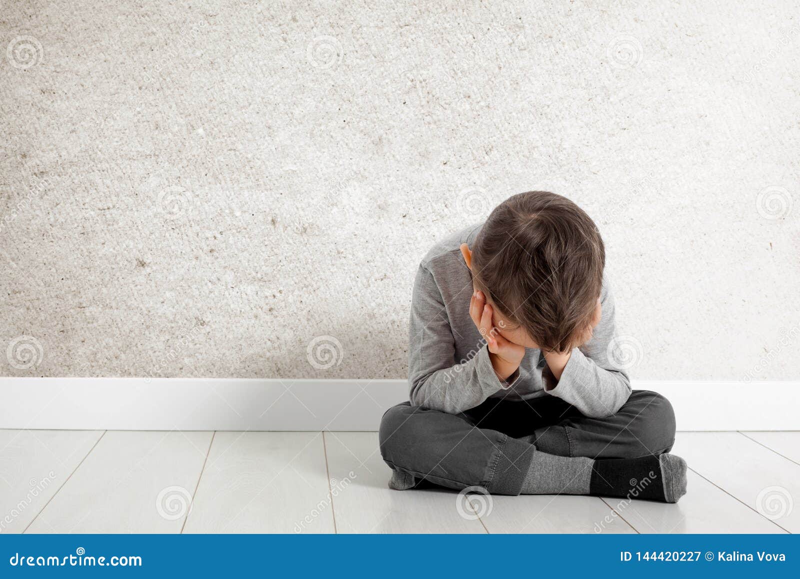 A Child Whose Depression is Sitting on the Floor Stock Image - Image of ...