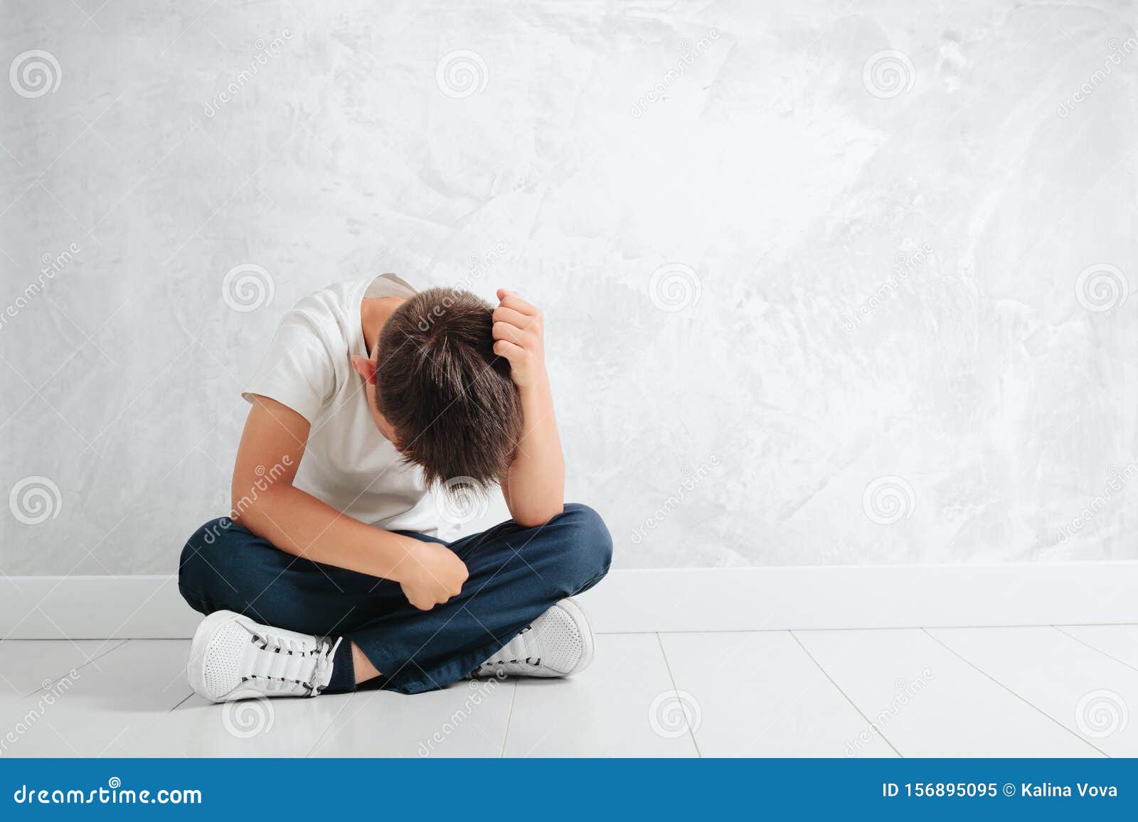 A Child Whose Depression is Sitting on the Floor Stock Image - Image of ...