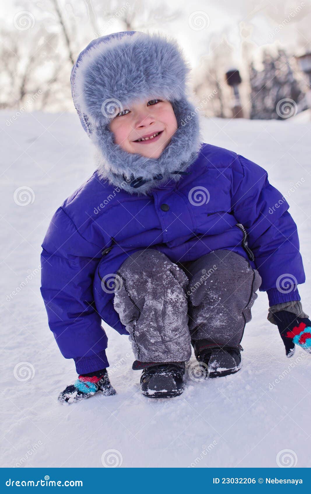 Child in winter stock photo. Image of hillock, mittens - 23032206