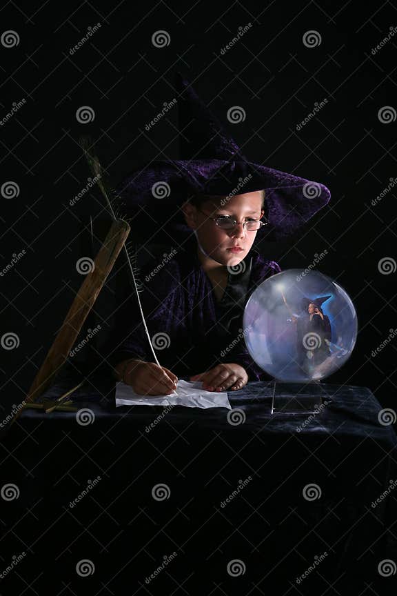 Child Wizard Writing a Spell Stock Image - Image of staff, crystal: 6325397