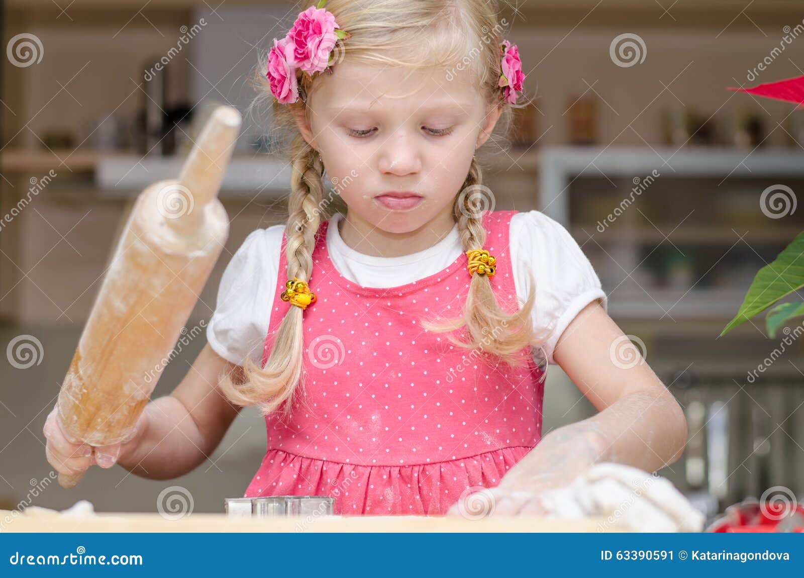 Child working in kitchen stock image. Image of happy - 63390591