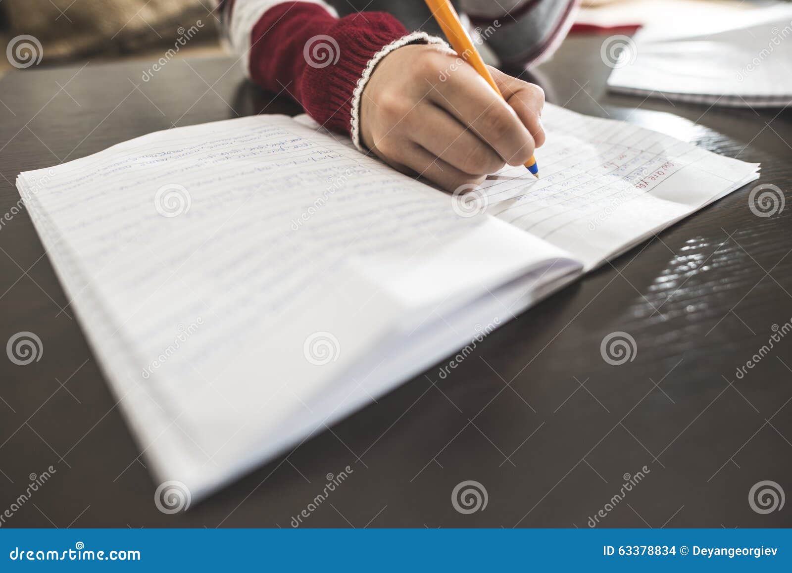 Child write in a notebook. stock photo. Image of study - 63378834