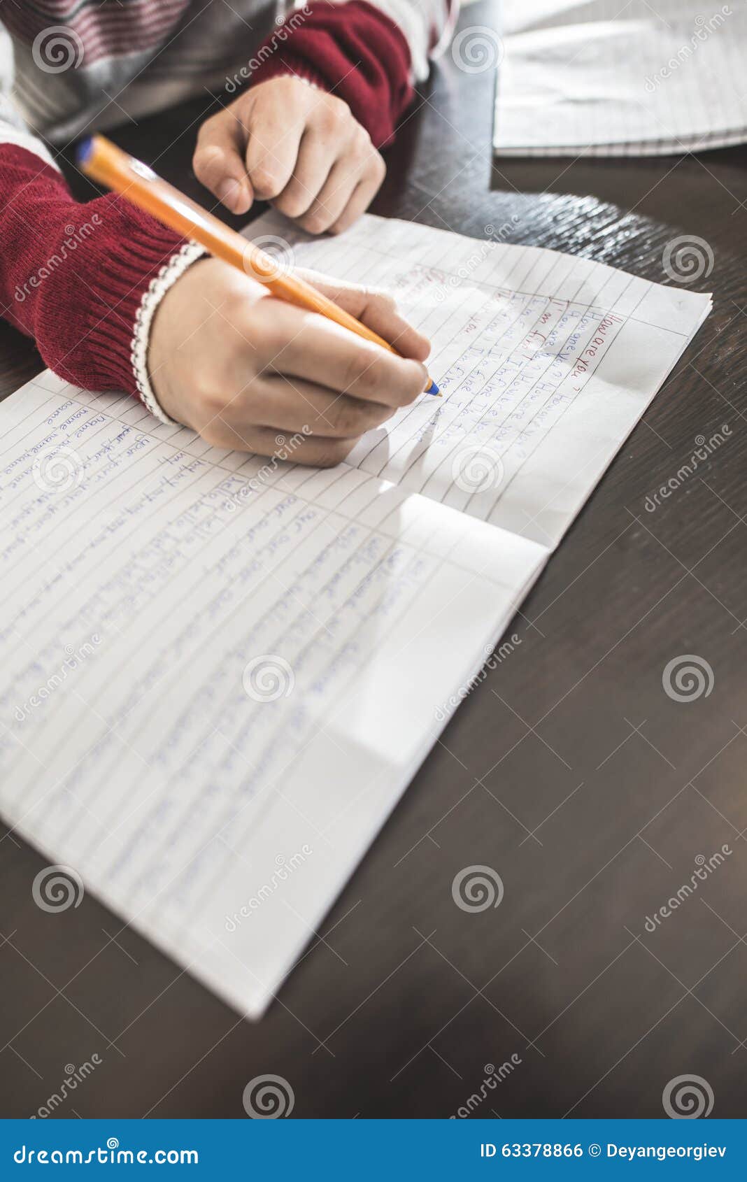 Child write in a notebook. stock photo. Image of hand - 63378866