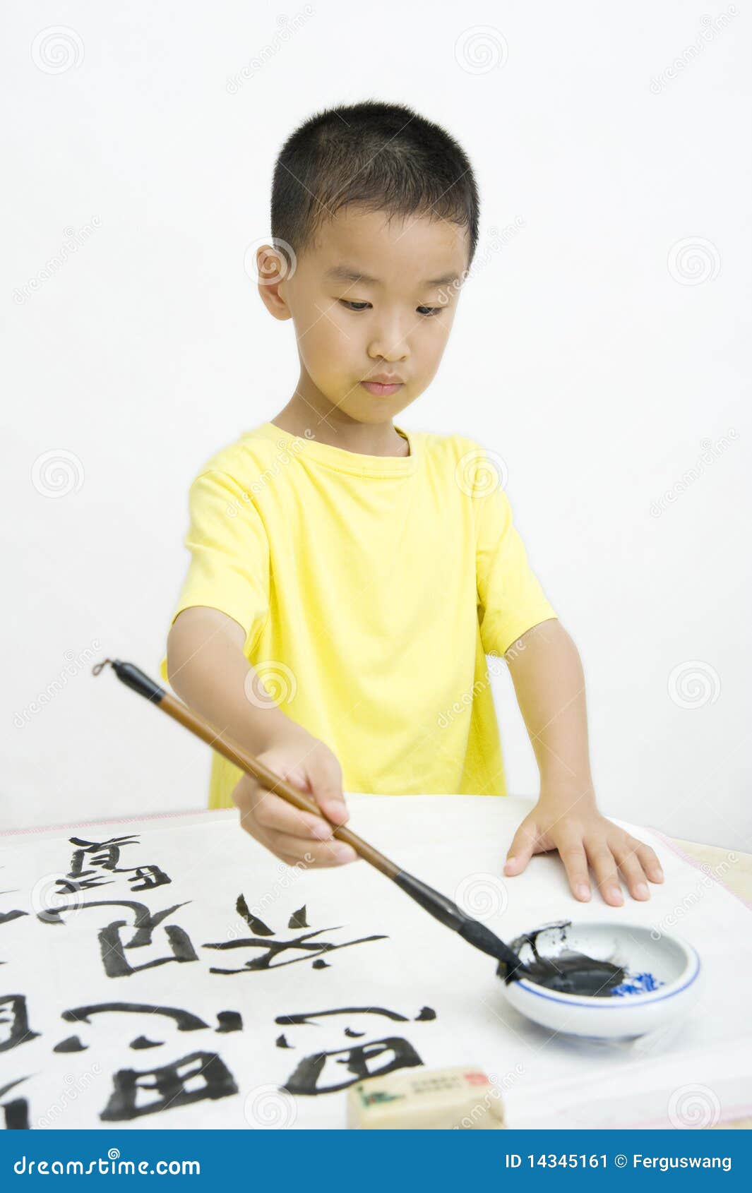 A Child Writing Chinese Calligraphy Stock Image - Image of indoors ...