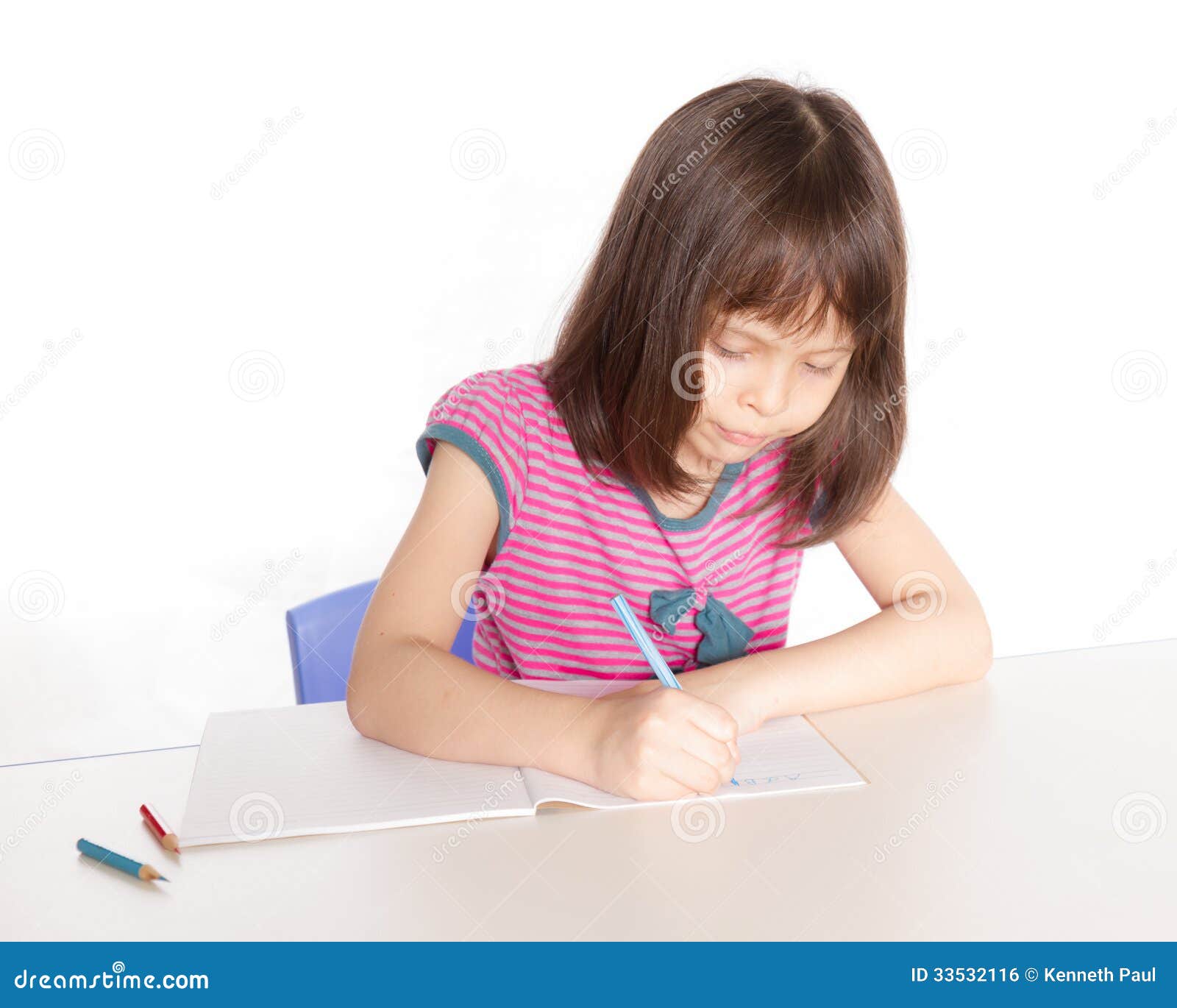 Child writing at desk stock photo. Image of shot, person - 33532116