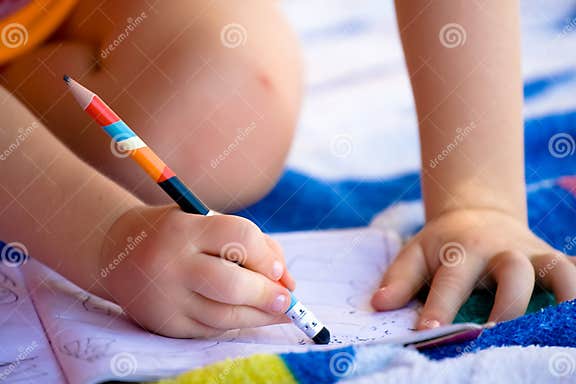 Child writing and drawing stock photo. Image of small - 3852402