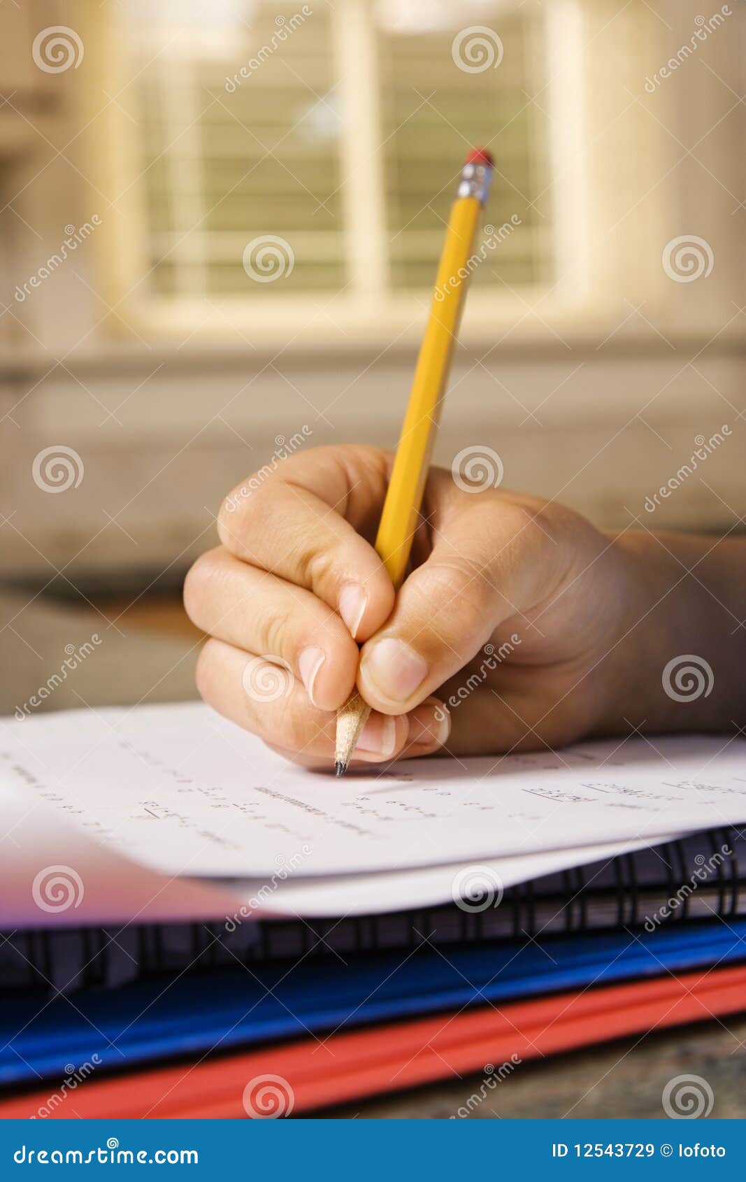 Child Writing in Notebook stock image. Image of paper - 12543729