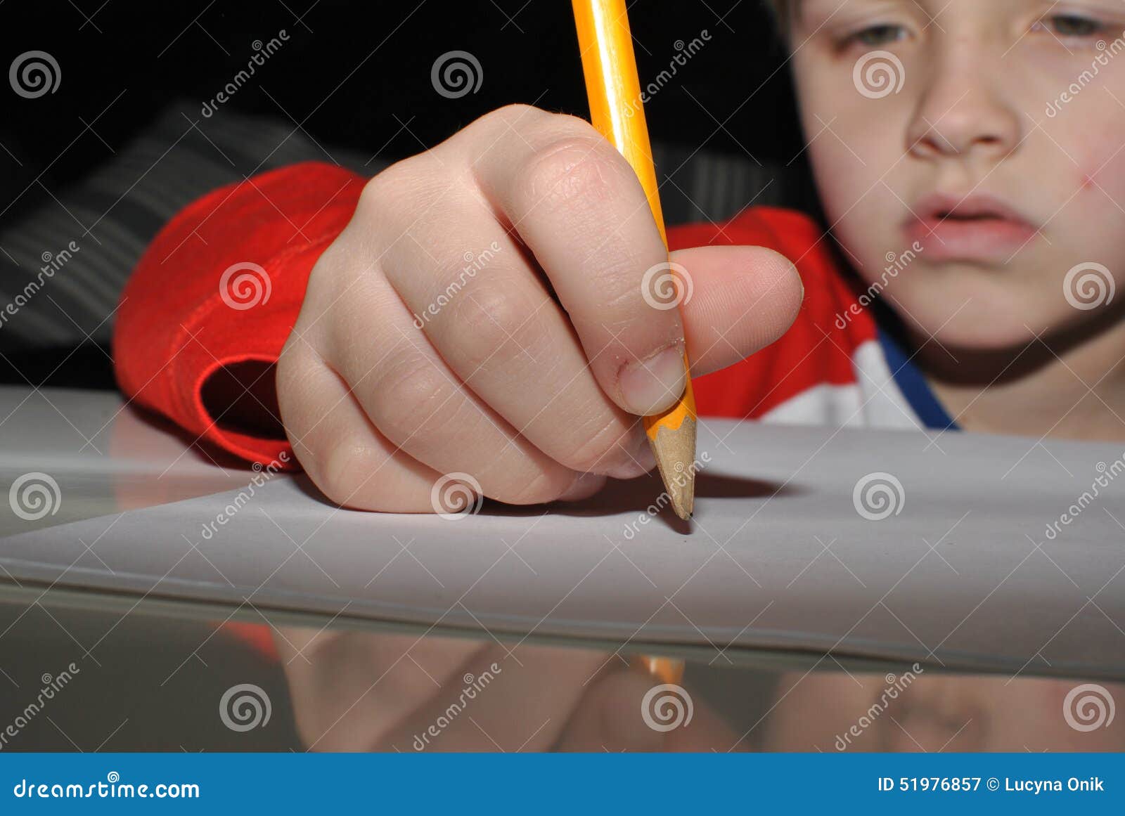 Child writing with pencil stock image. Image of school - 51976857