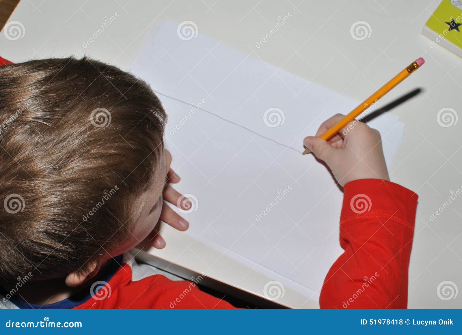 Child writing with pencil stock photo. Image of drawing - 51978418