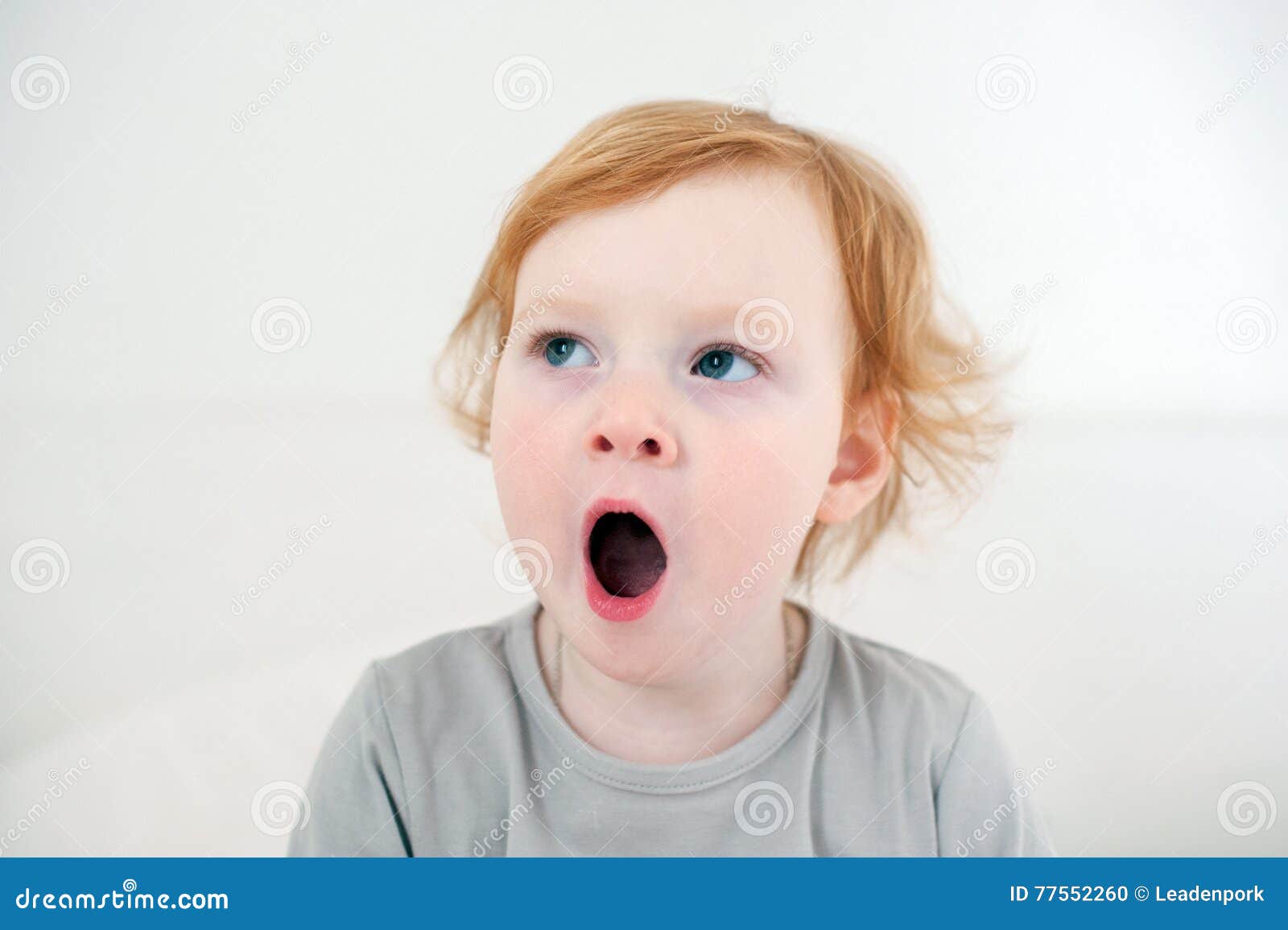 The child yawns stock photo. Image of pretty, ginger - 77552260