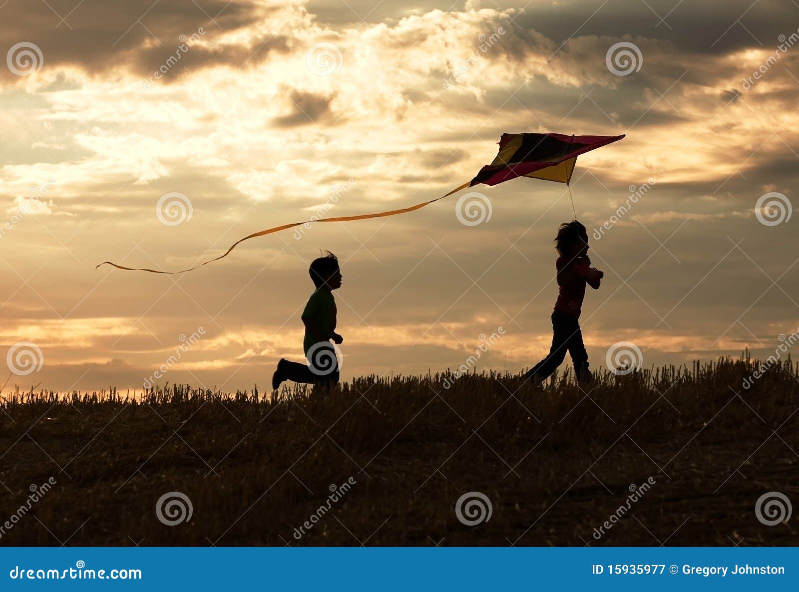 Childhod fun at sunset. stock image. Image of delight - 15935977