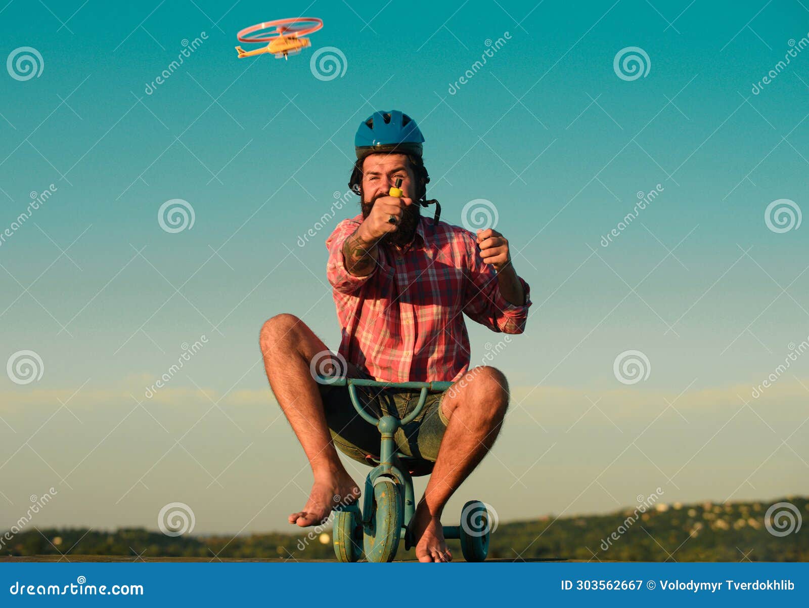 Childhood Memory. Crazy Young Man Riding Three Wheeled Bicycle. Stock ...