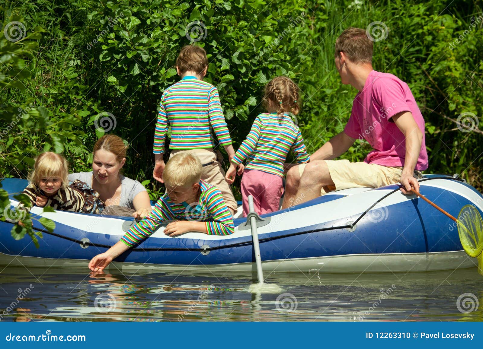 Children and Adults Float on an Inflatable Boat Stock Photo - Image of ...