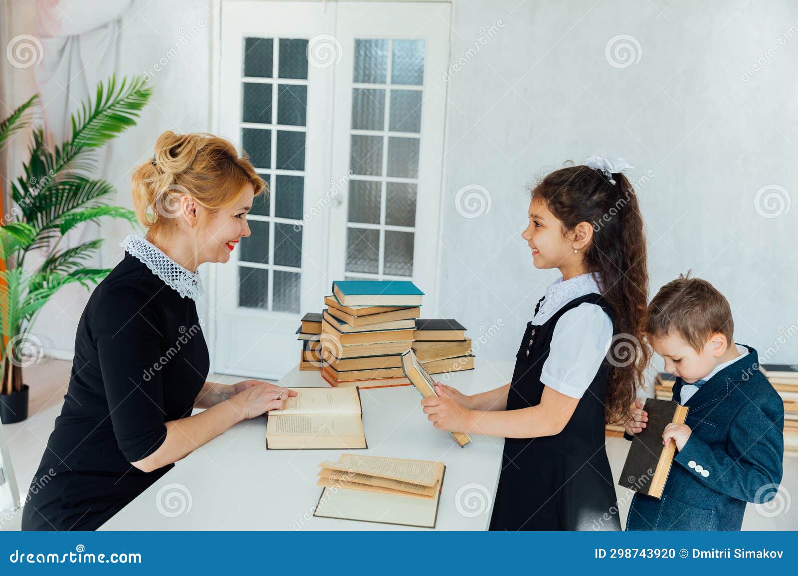 Children Answer a Question To a Teacher at School Stock Photo - Image ...