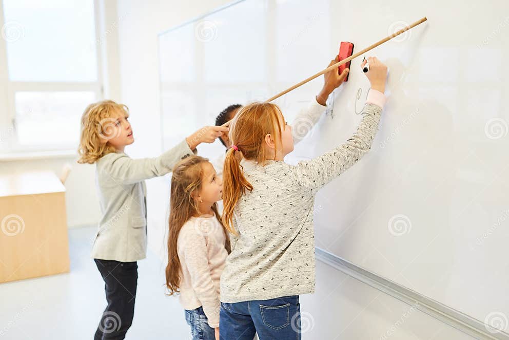 Pupils Solve in Teamwork Math Task Stock Photo - Image of learn, girl ...