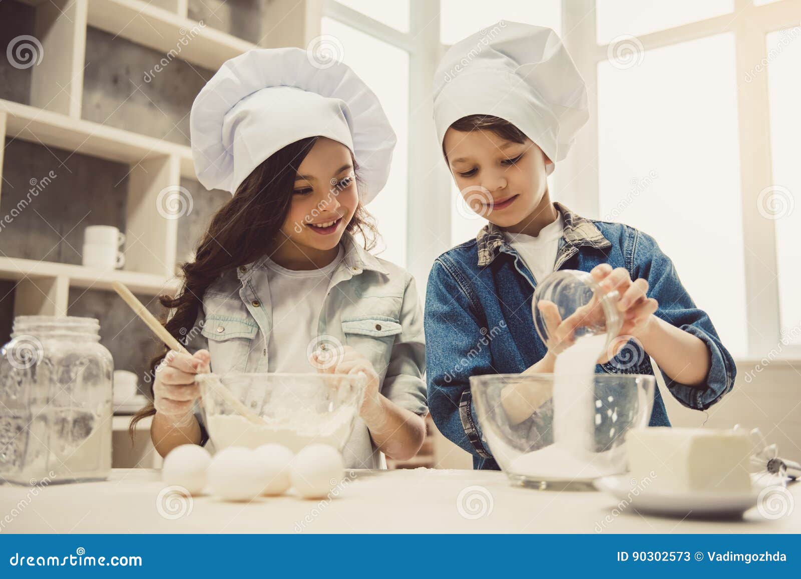 Children baking in kitchen stock image. Image of brother - 90302573
