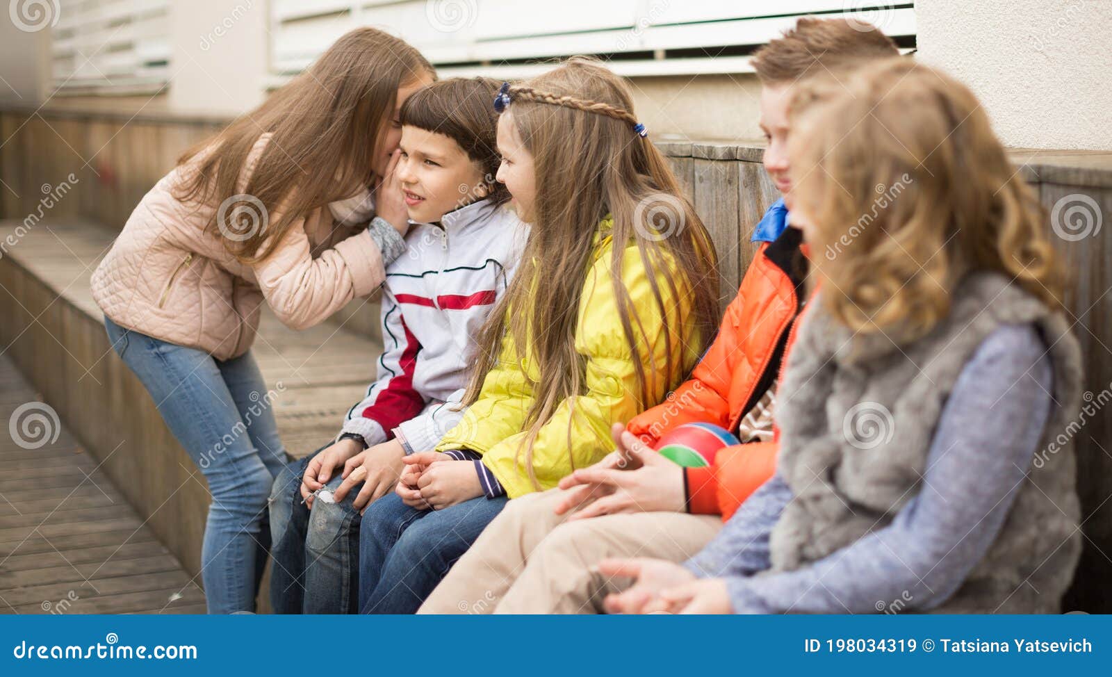 Children on a Bench Playing Chinese Whispers Stock Image - Image of ...