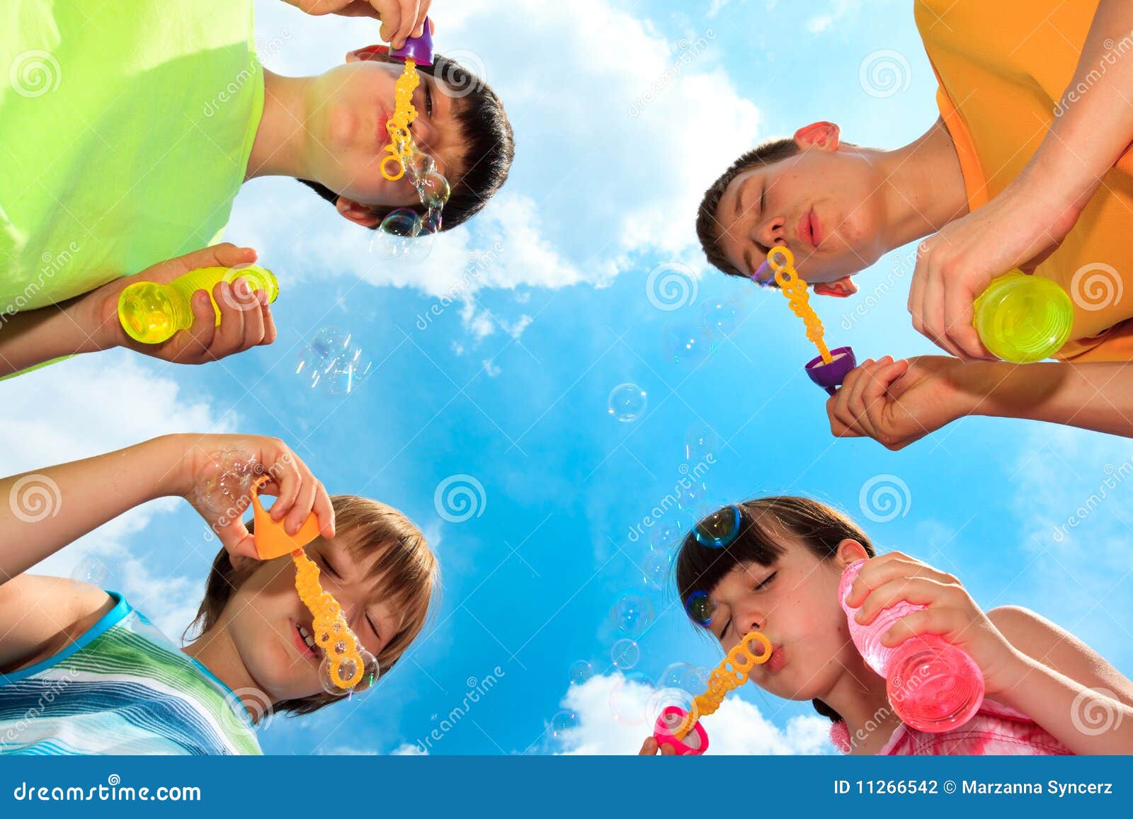 Children blowing bubbles stock photo. Image of happy - 11266542