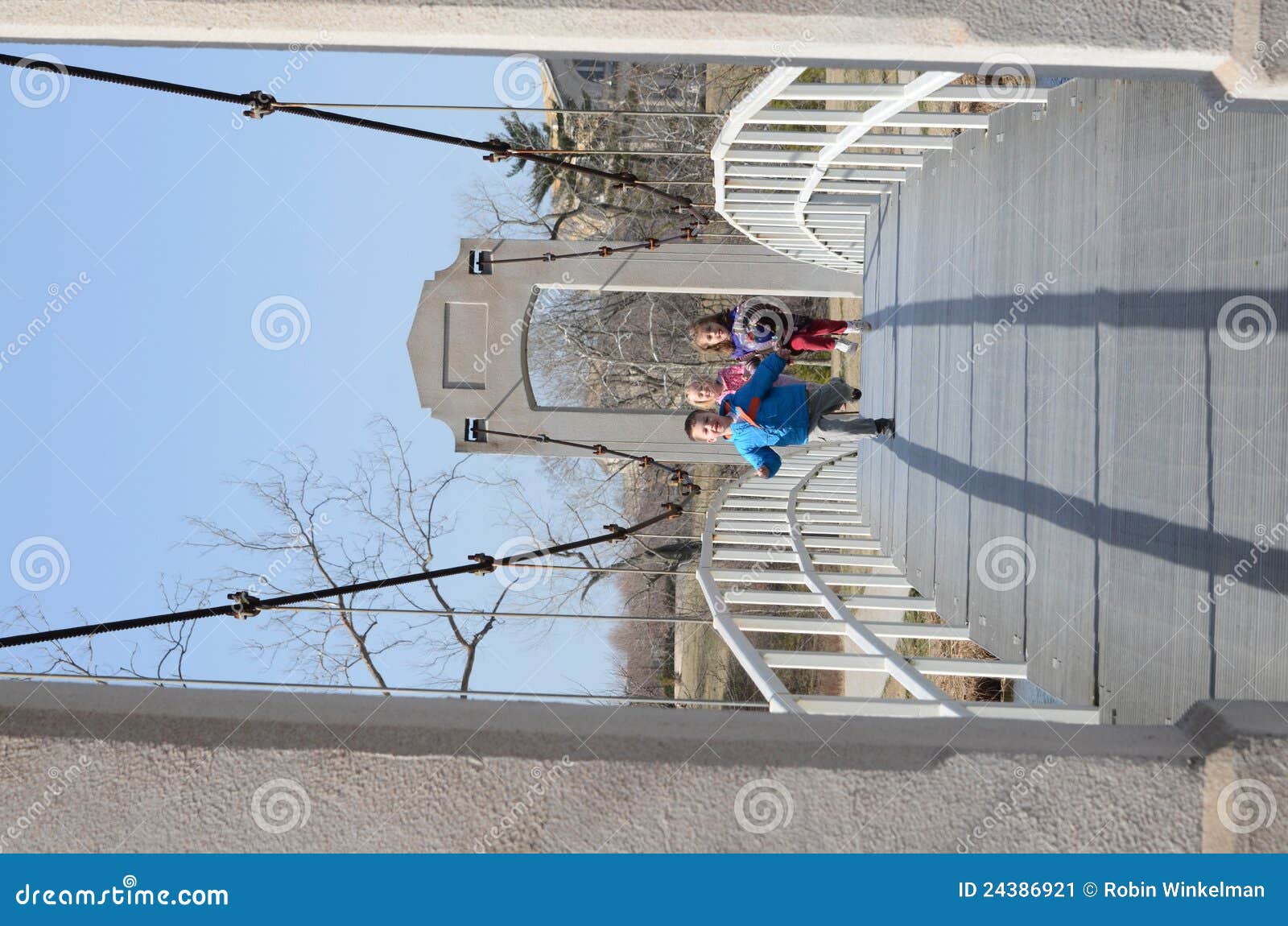 Children and a bridge stock image. Image of chasing, lead - 24386921