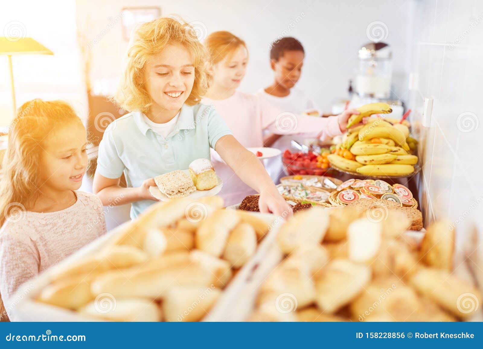 Children Bring Food at the Buffet of a Canteen Stock Photo - Image of ...