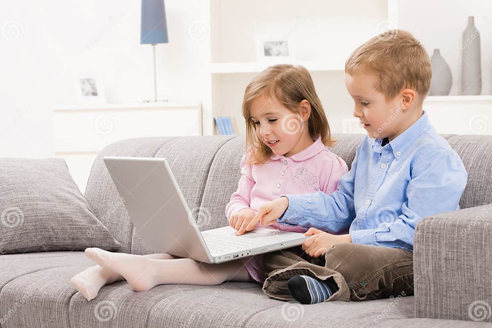 Children browsing internet stock image. Image of home - 9334769