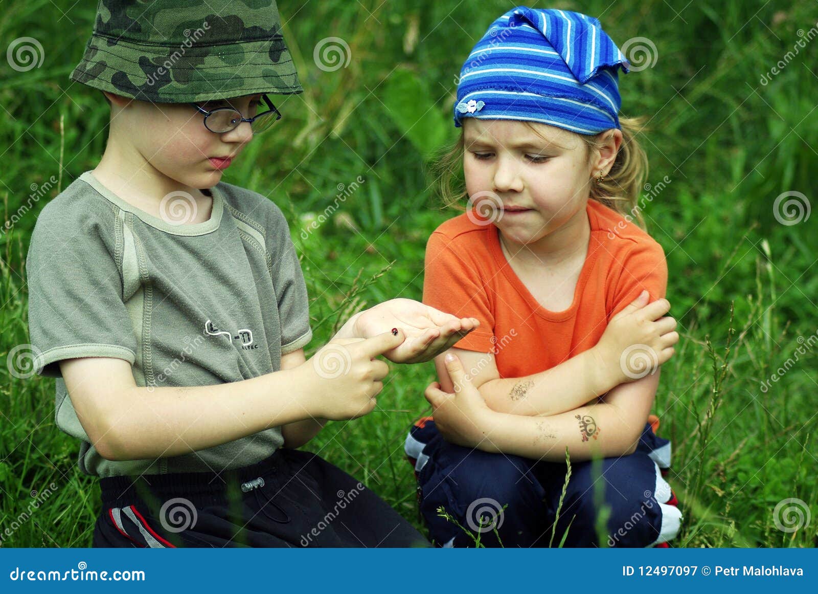 Children with bug stock image. Image of fascinate, sitting - 12497097
