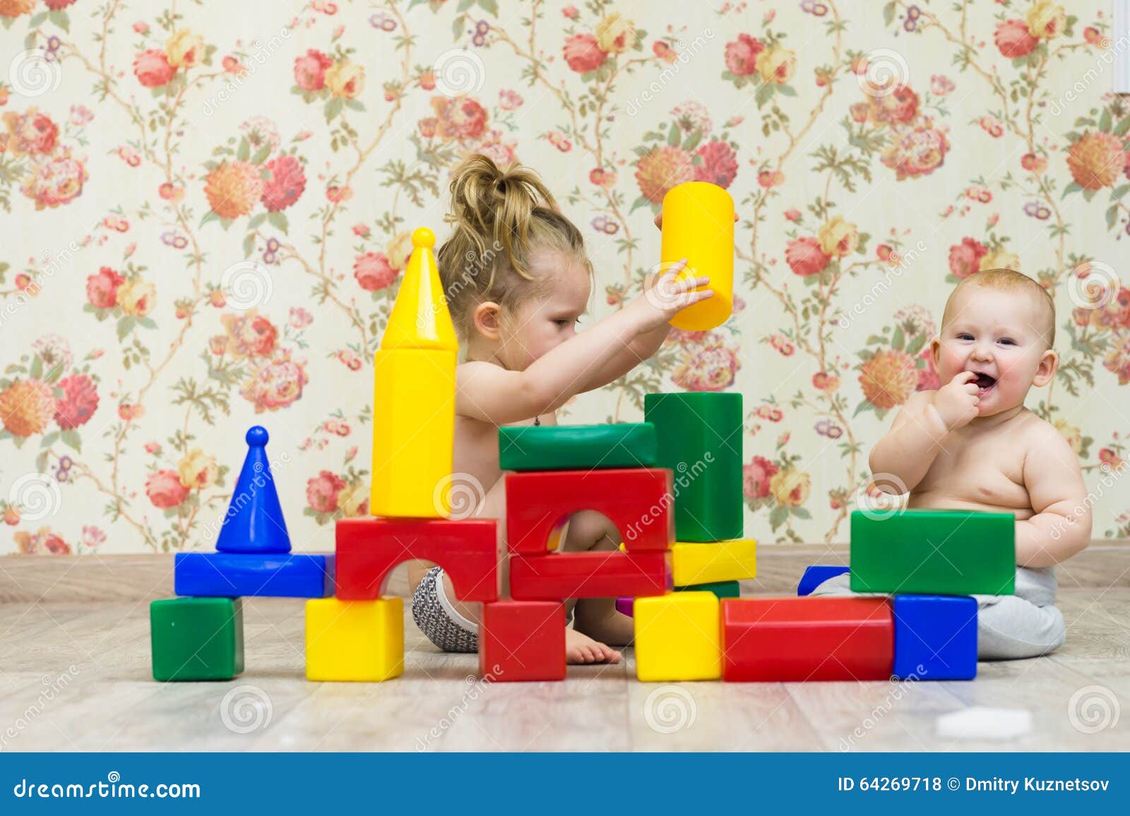 Two Children Build A Prototype Circuit With A Red Laser Controlled By A ...