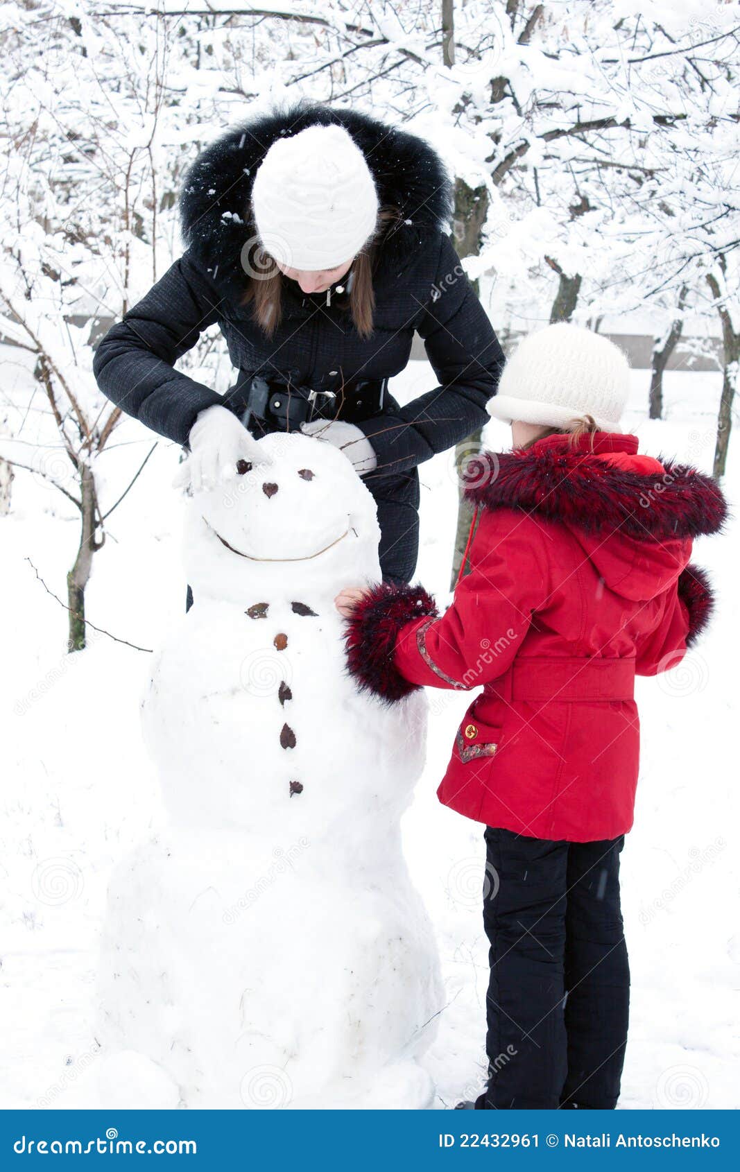 Children build the snowman stock image. Image of childhood - 22432961