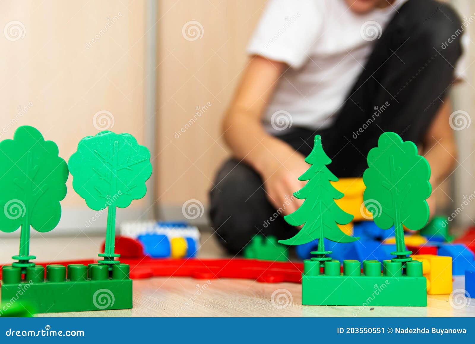 Children Built Out of the Park. Boy and Girl are Playing Constructor ...