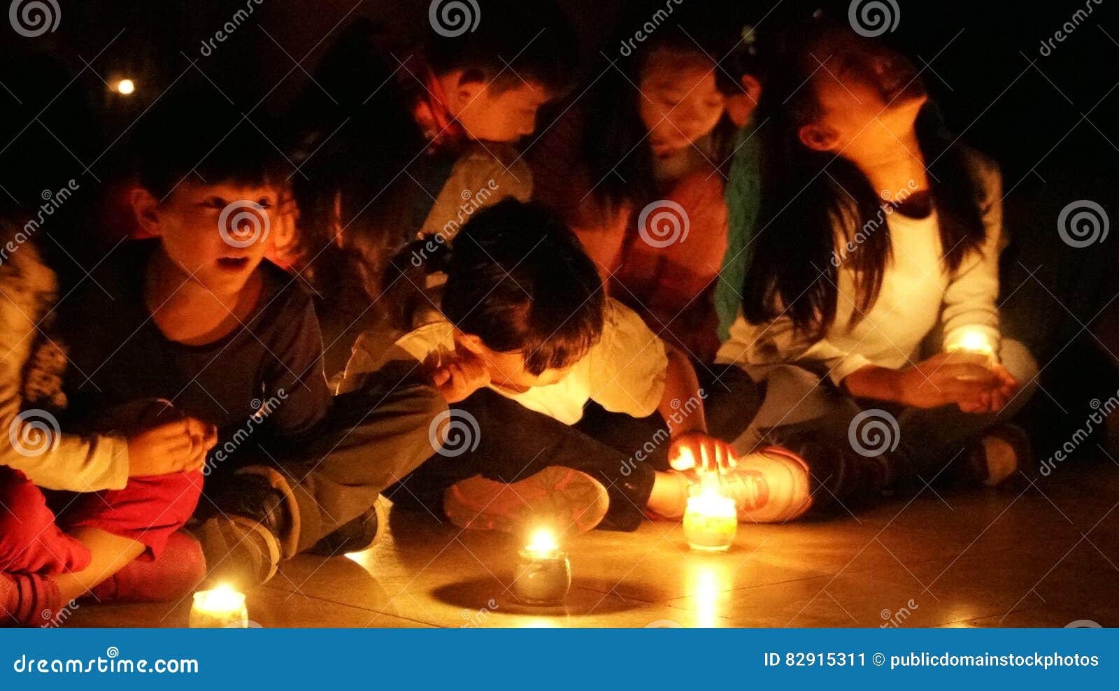 Children At Candlelight Event Picture. Image: 82915311