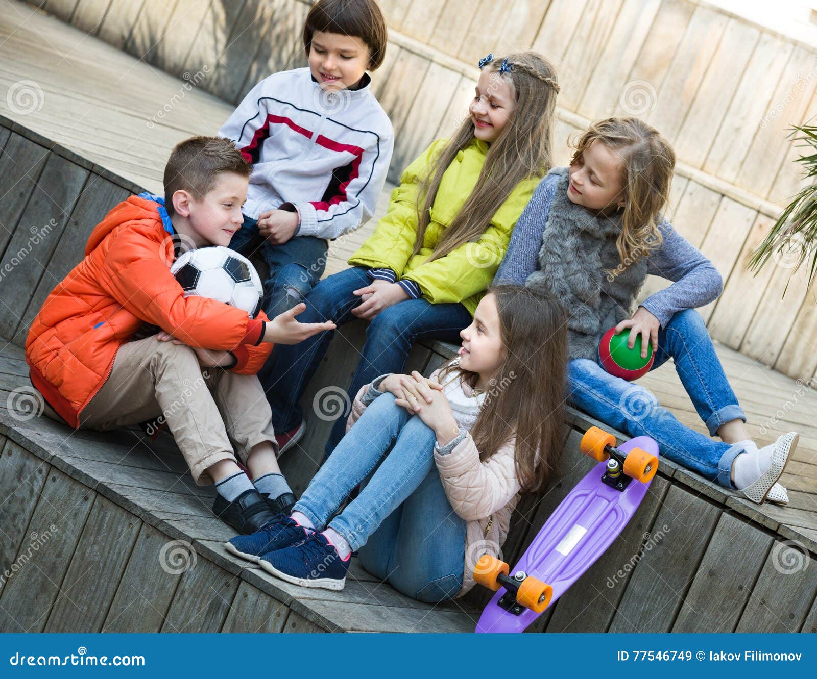 Children chatting outdoors stock image. Image of outside - 77546749
