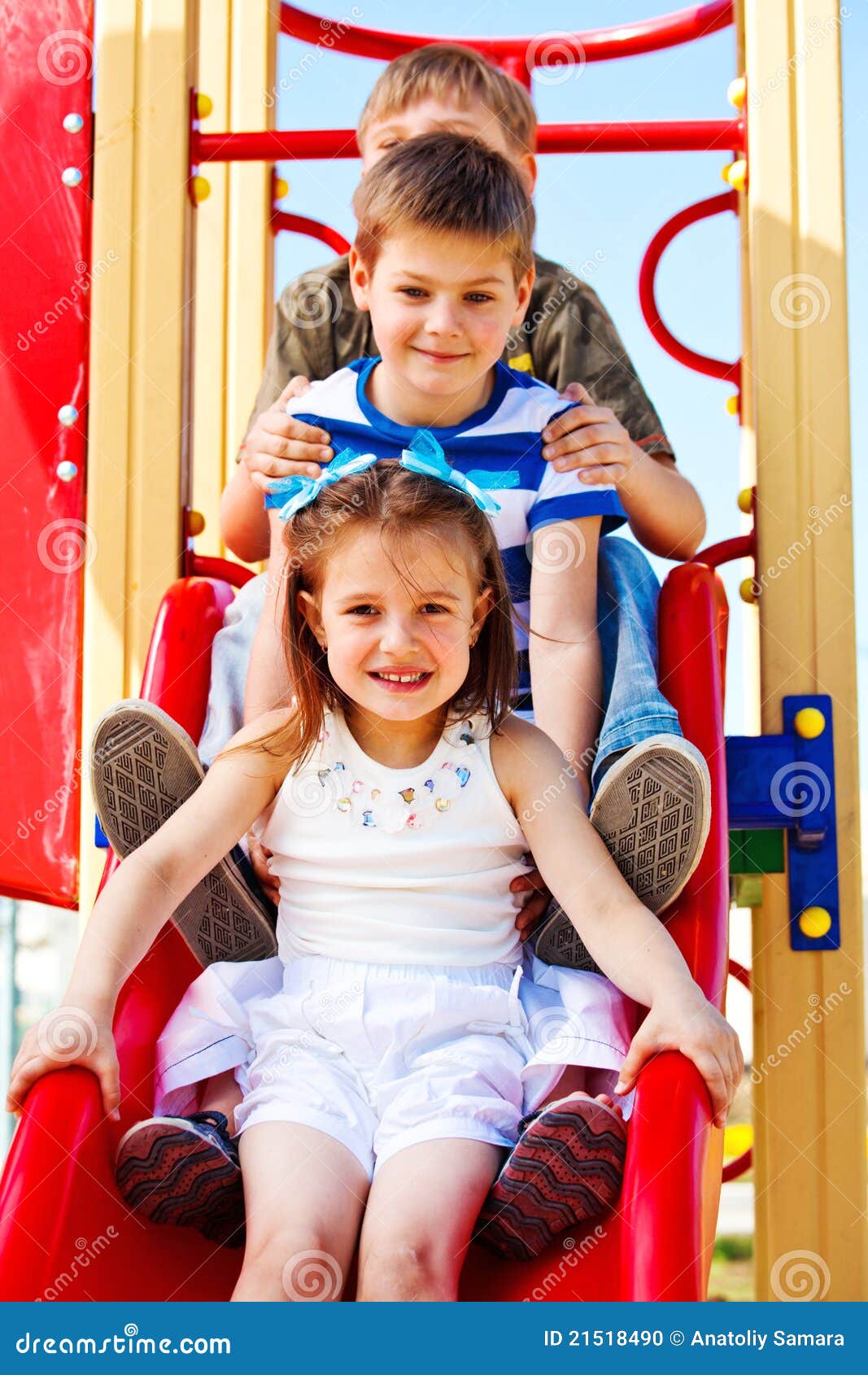 Children on the chute stock photo. Image of cute, outside - 21518490