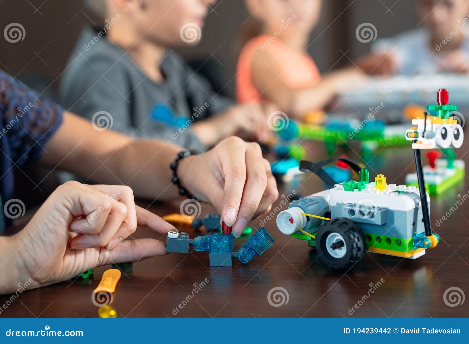 Children in the Classroom Collect Figure from the Designer. Stock Photo ...