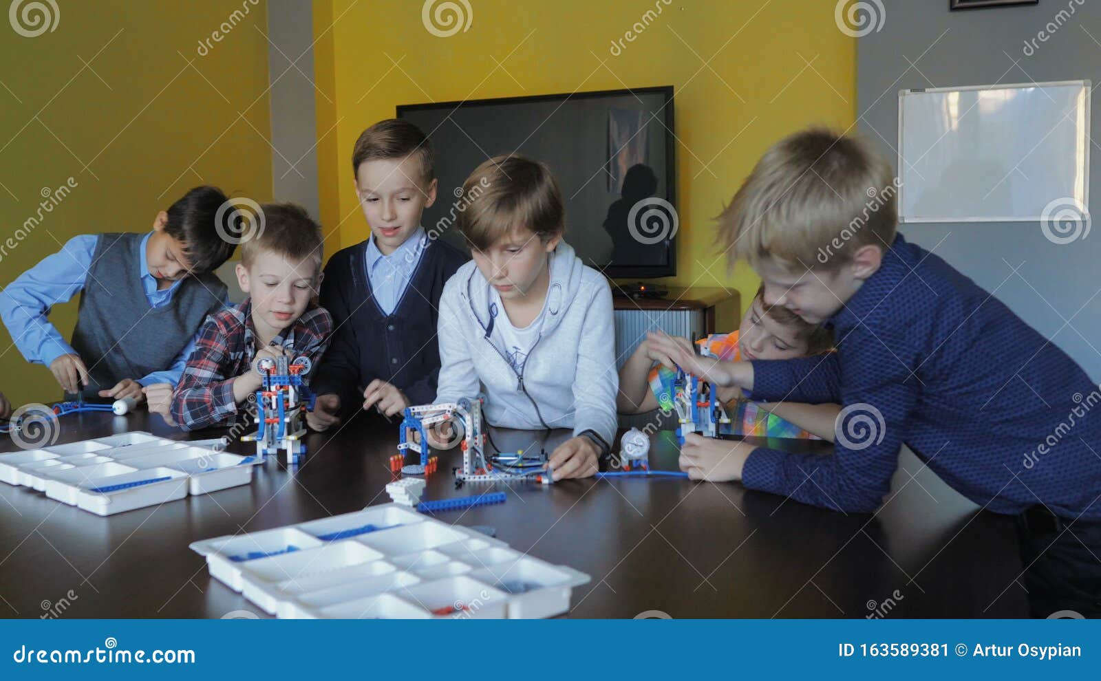 Children in the Classroom Make Figures with Teacher. Modern Technology ...