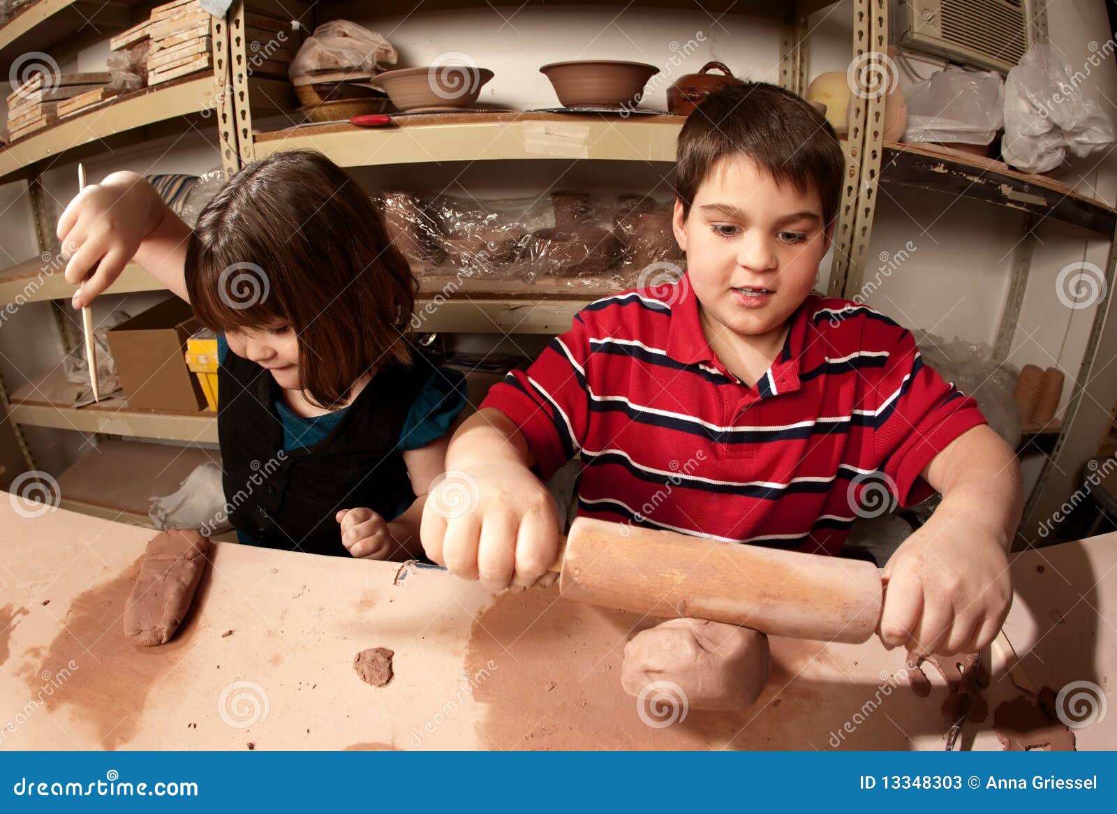 Children in a clay studio stock image. Image of messy - 13348303
