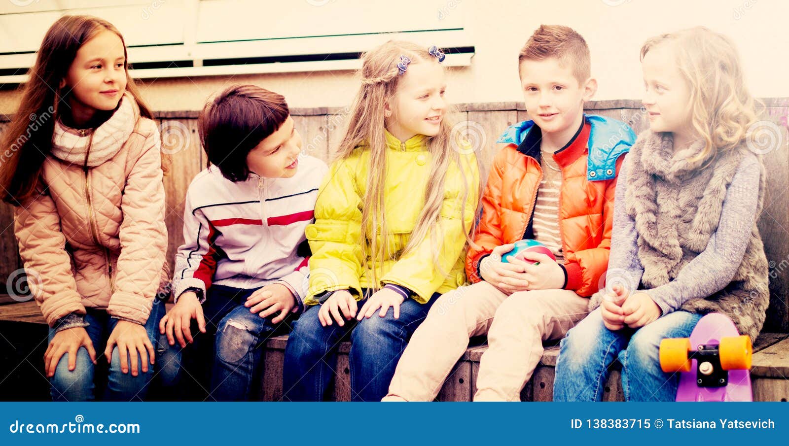 Children Communicate Online On A Computer. The Girl And The Boy Are ...