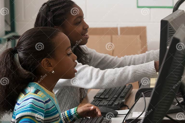 Children at a computer stock photo. Image of child, smile - 11962482