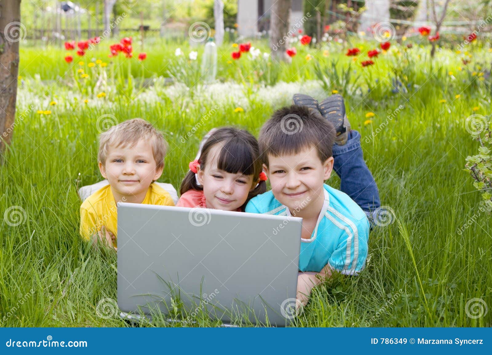 Children with computer stock image. Image of young, meadow - 786349