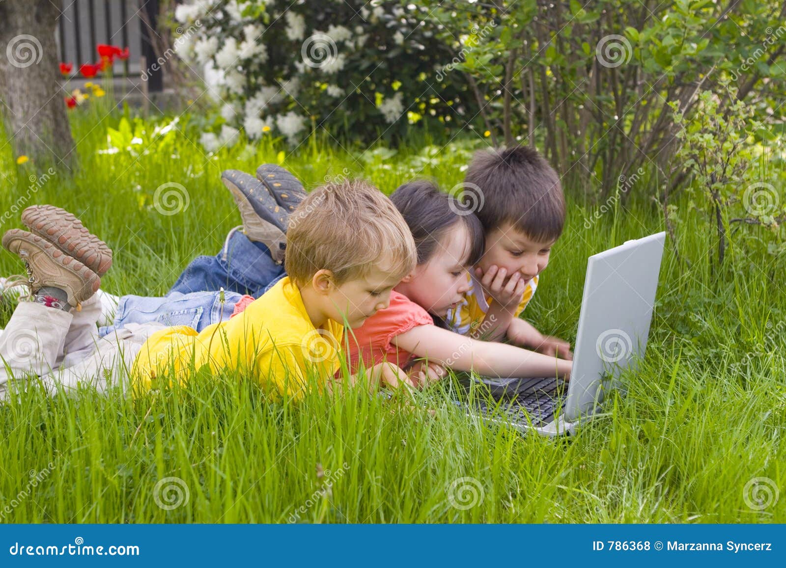 Children with computer stock photo. Image of flowers, flower - 786368