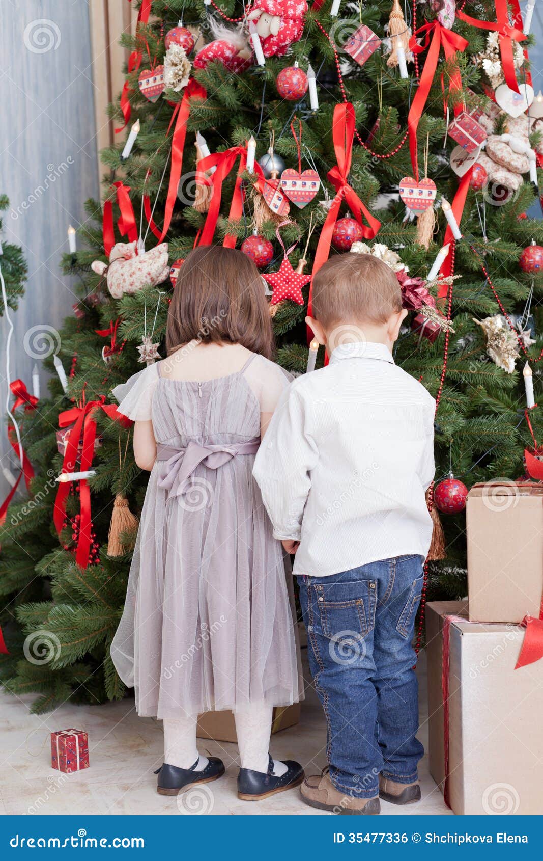 Children Decorate a Christmas Tree Stock Photo - Image of girl, baby ...