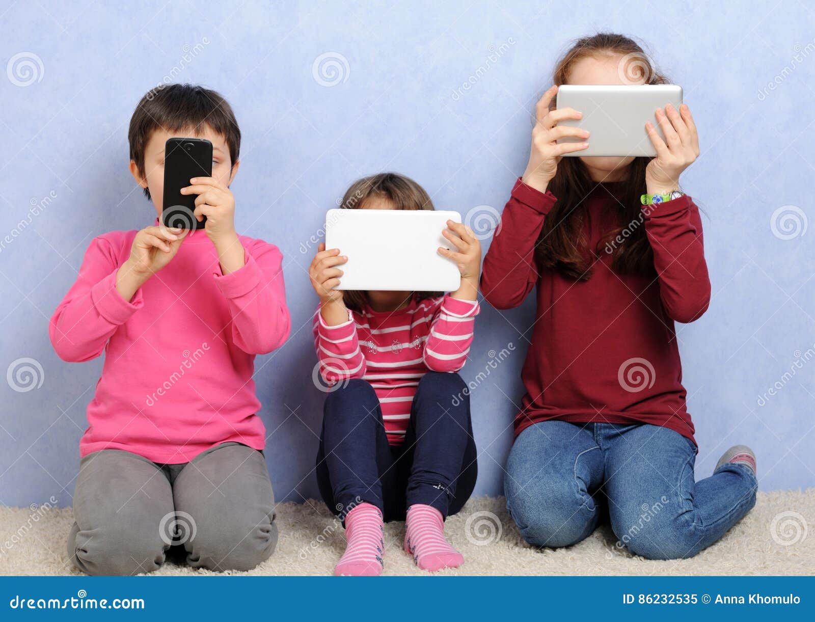 Children With Devices Stock Image | CartoonDealer.com #86232535
