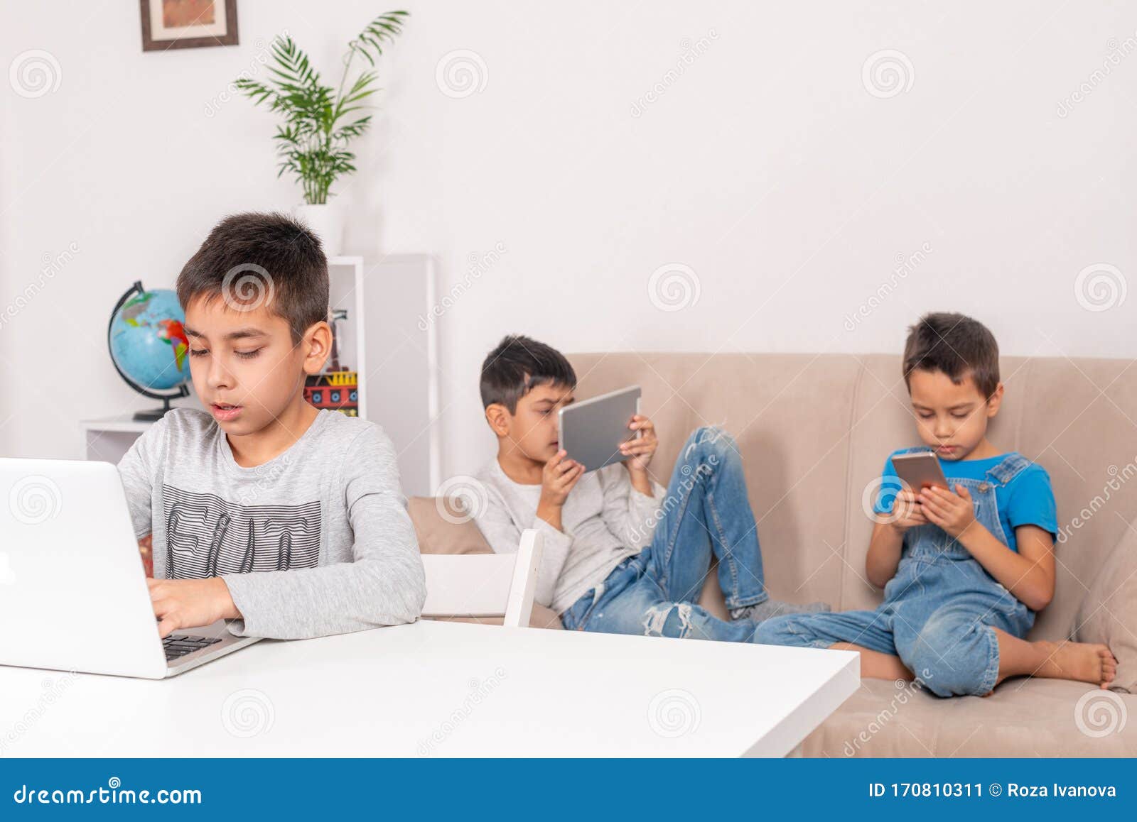 Children of Different Ages Use Gadgets for Games, Communication and for ...