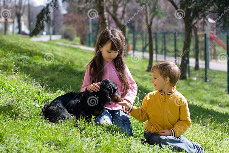 Children with Dog stock photo. Image of sitting, looking - 2191250