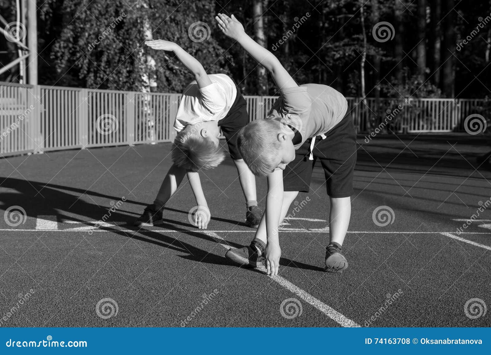 Children doing exercises stock photo. Image of exercise - 74163708