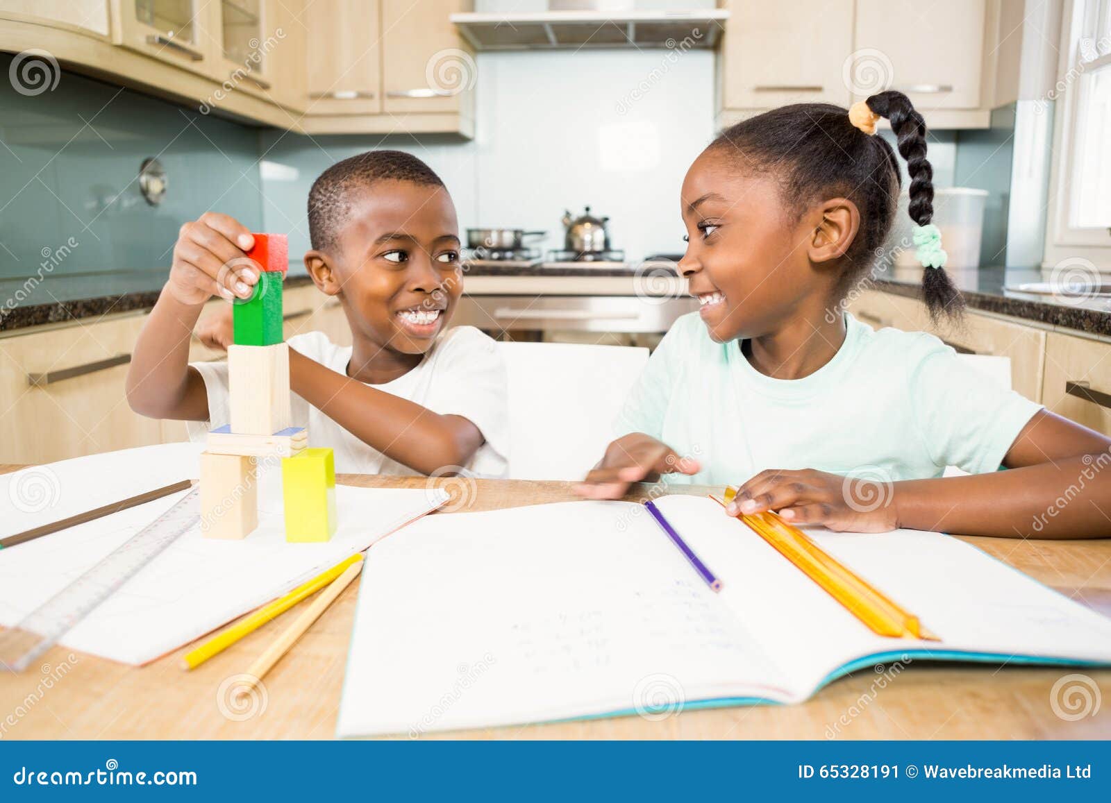 Children Doing Homework in the Kitchen Stock Image - Image of braids ...