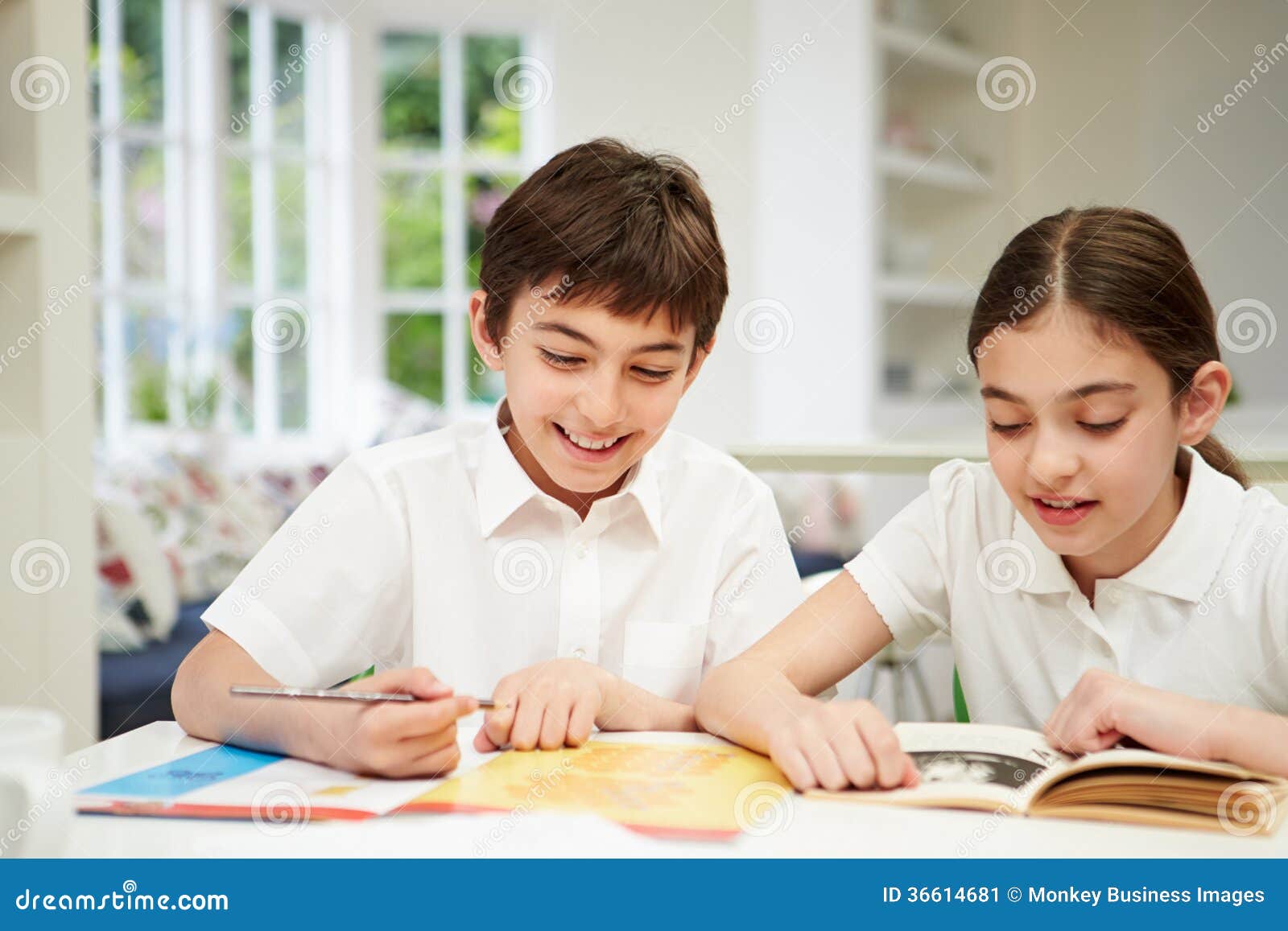Children Doing Homework in Kitchen Stock Image - Image of writing ...