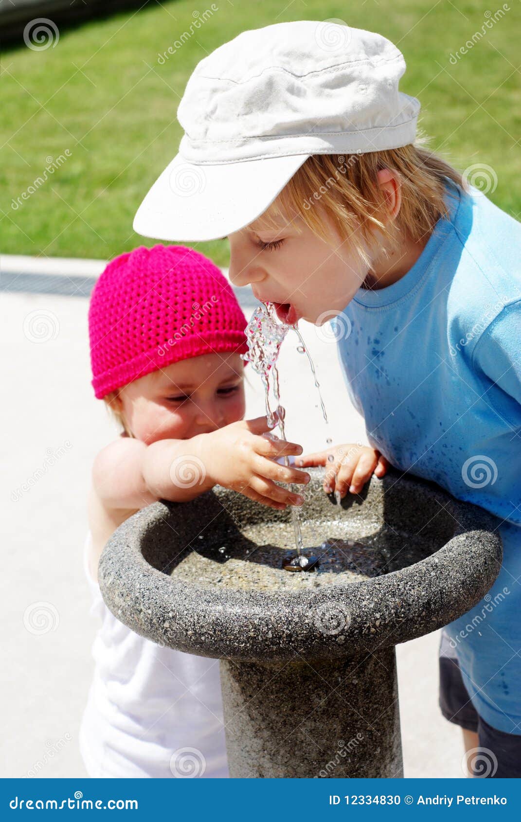 Children Drinking Water in a Drinking Fountain Stock Photo - Image of ...